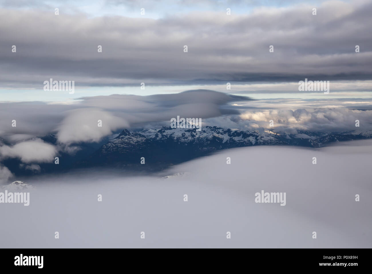 Aerial view of the striking Canadian Mountain Landscape covered in ...