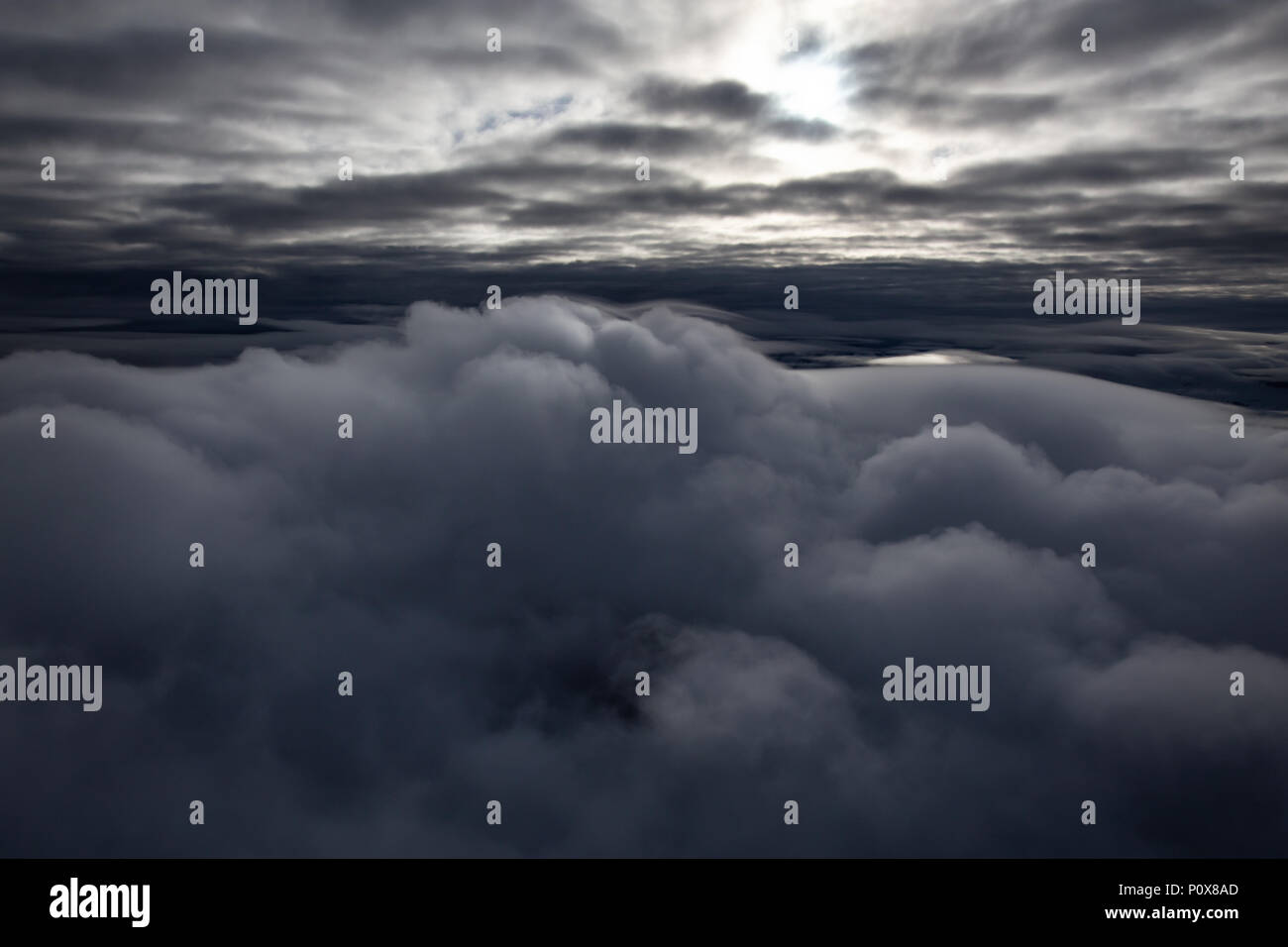Aerial cloudscape view of the puffy clouds. Taken North of Vancouver, British Columbia, Canada ...