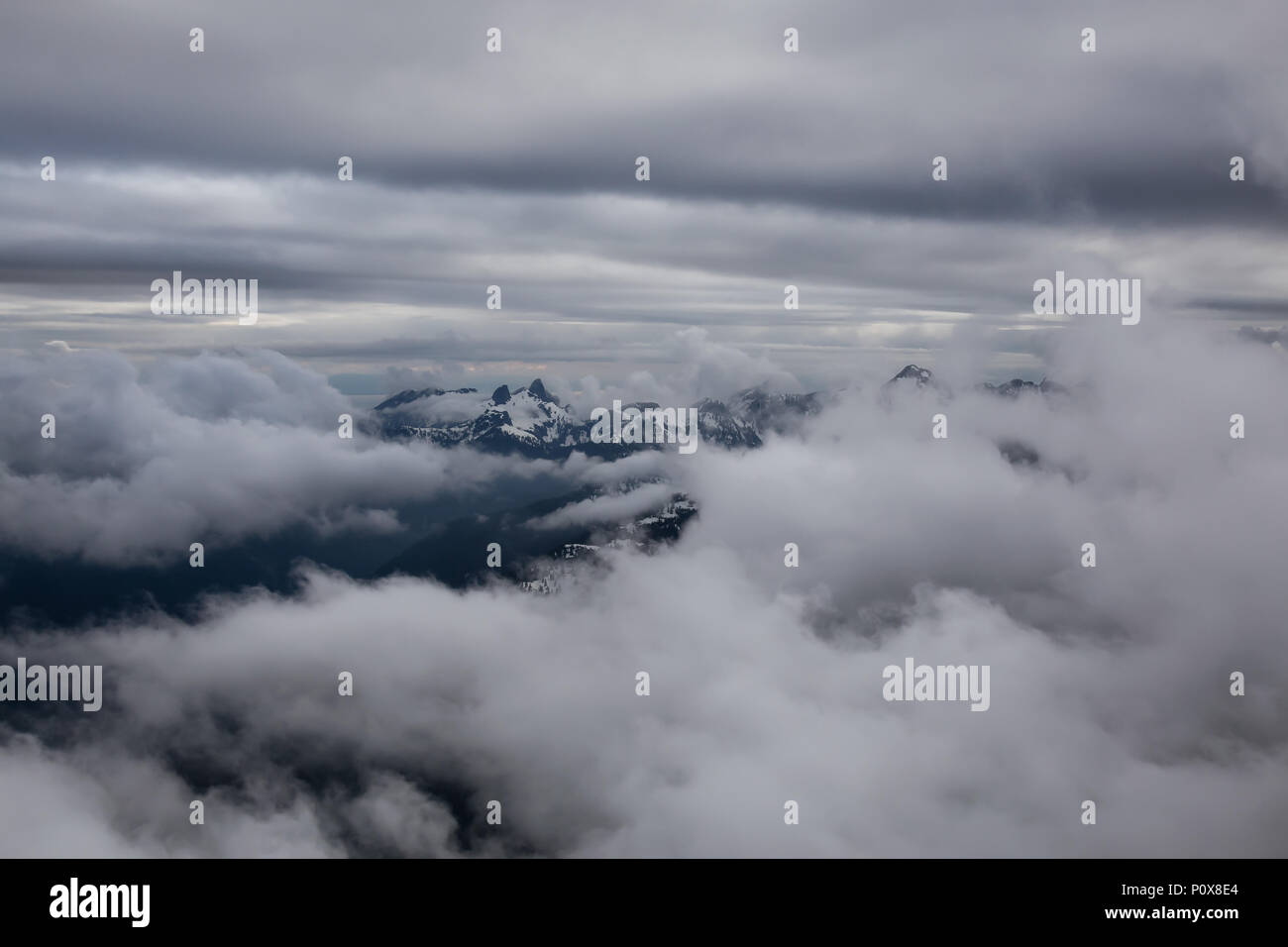 Aerial view of the striking Canadian Mountain Landscape covered in ...