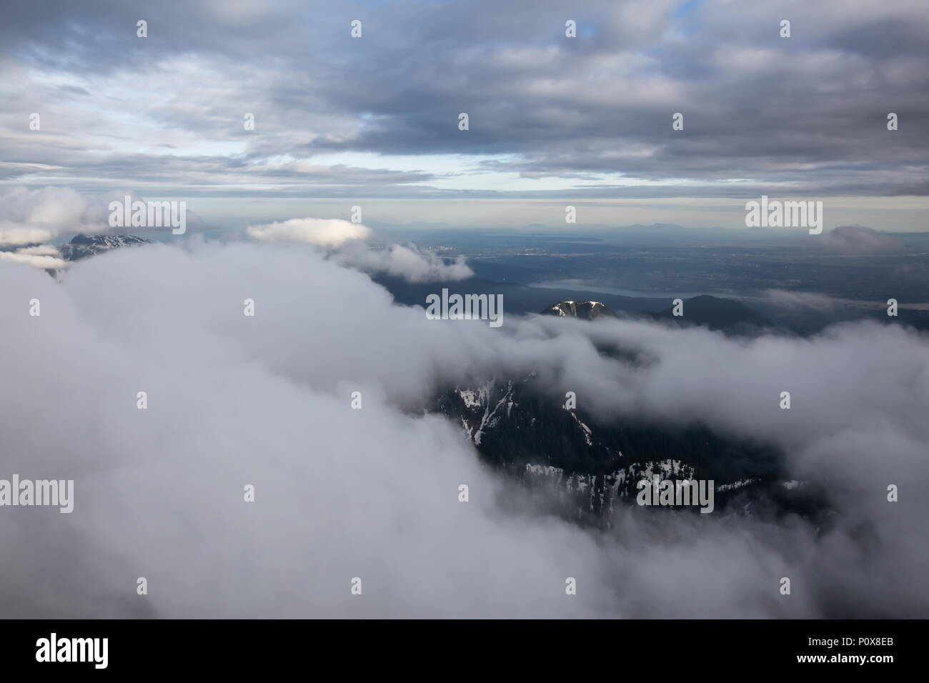 Aerial view of the striking Canadian Mountain Landscape covered in ...