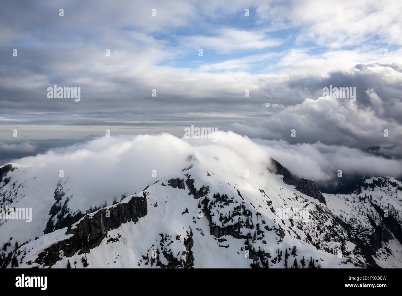 Aerial view of the striking Canadian Mountain Landscape covered in ...