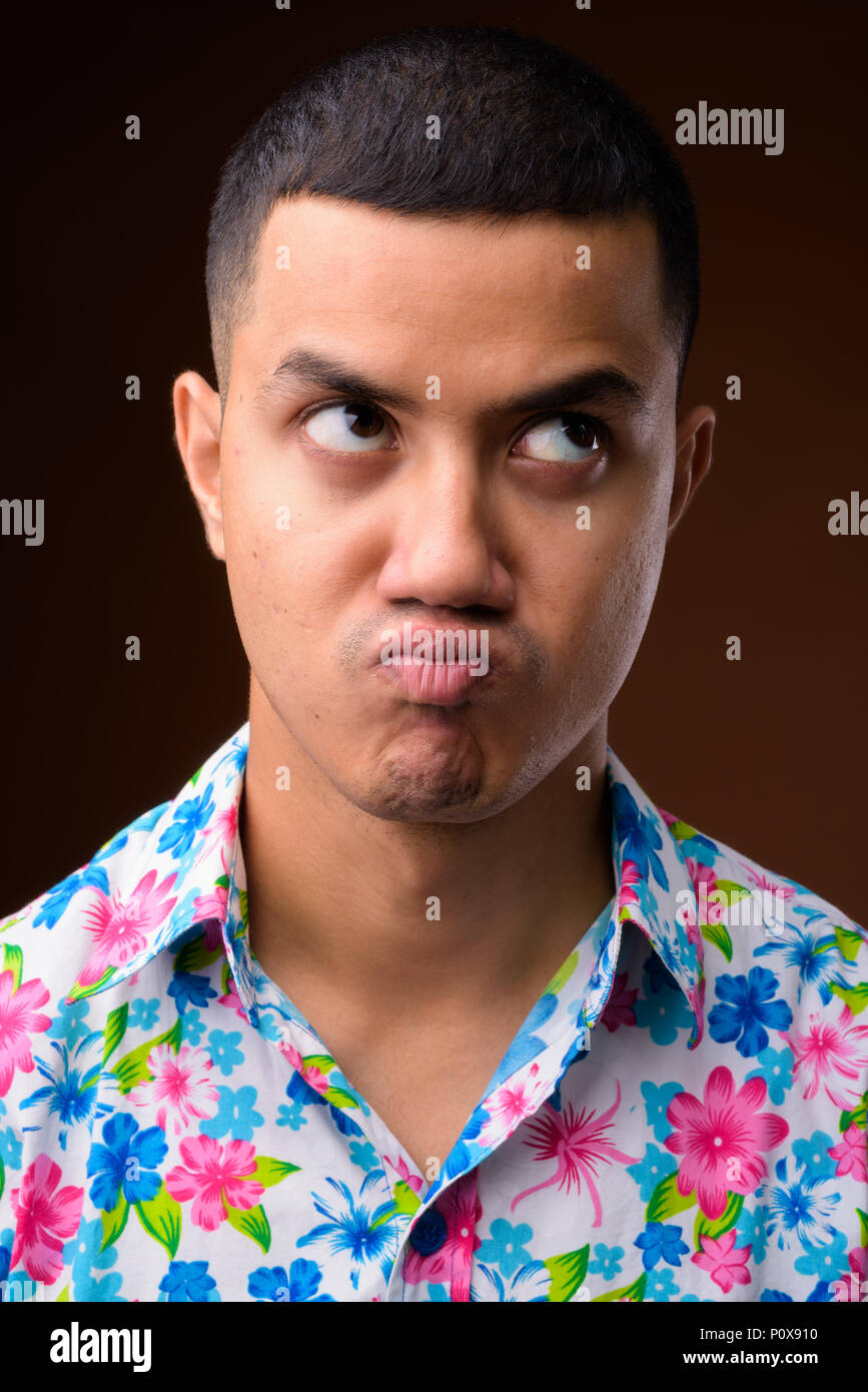 Asian man rolling hi-res stock photography and images - Alamy