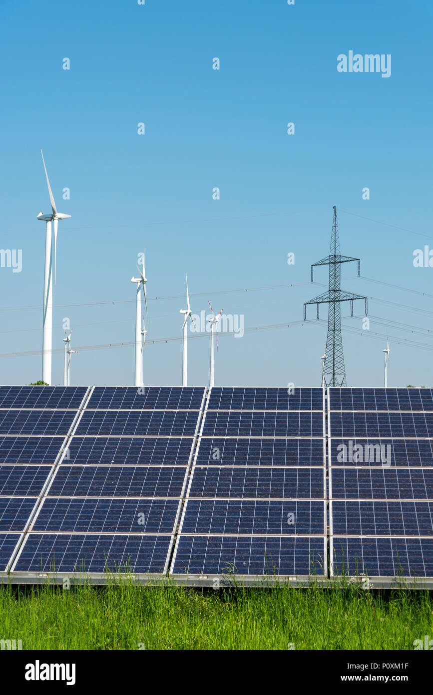 Electricity pylons, solar panels and wind engines seen in Germany Stock ...