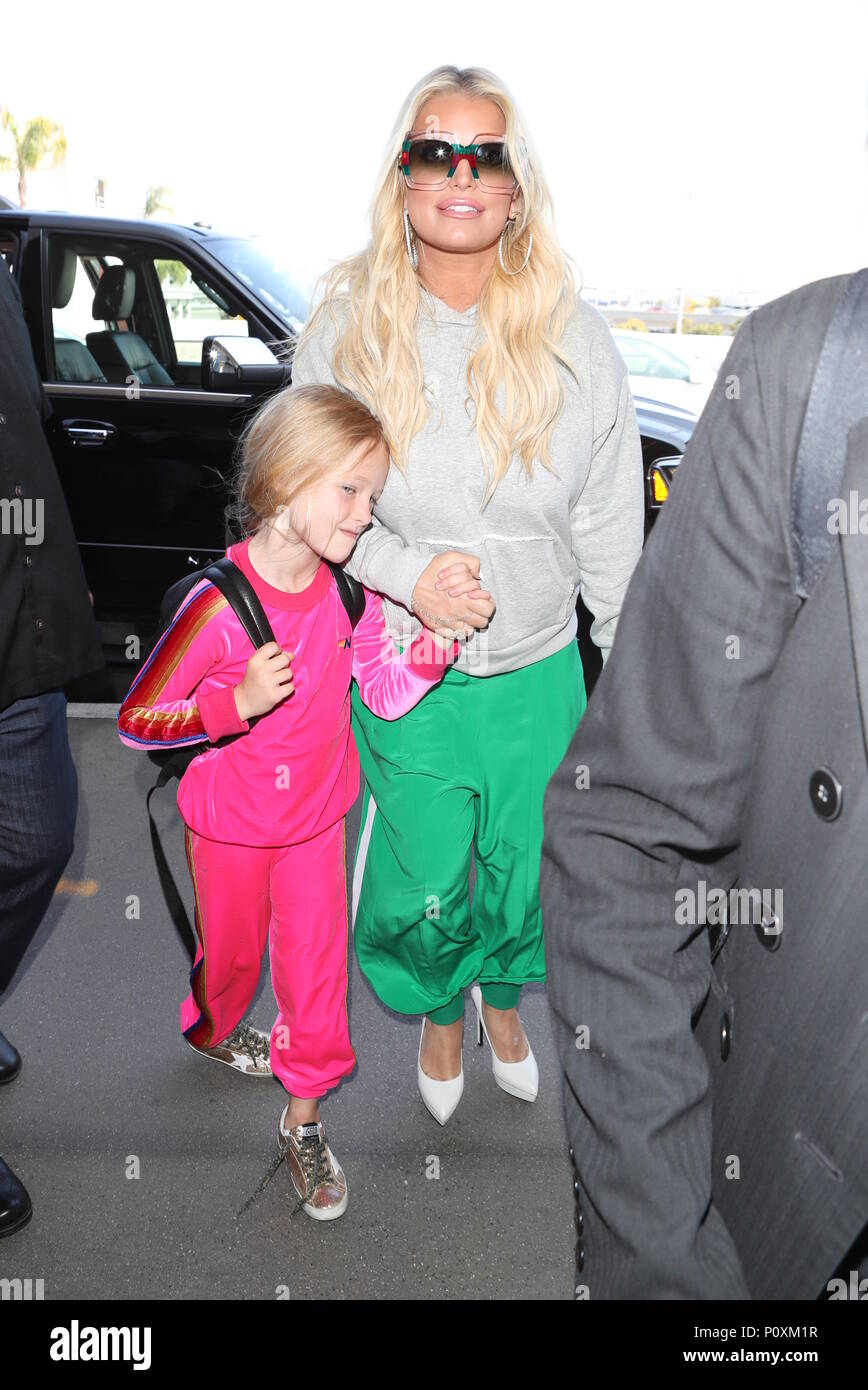 Jessica Simpson and Eric Johnson arrive at LAX airport in Los Angeles ...