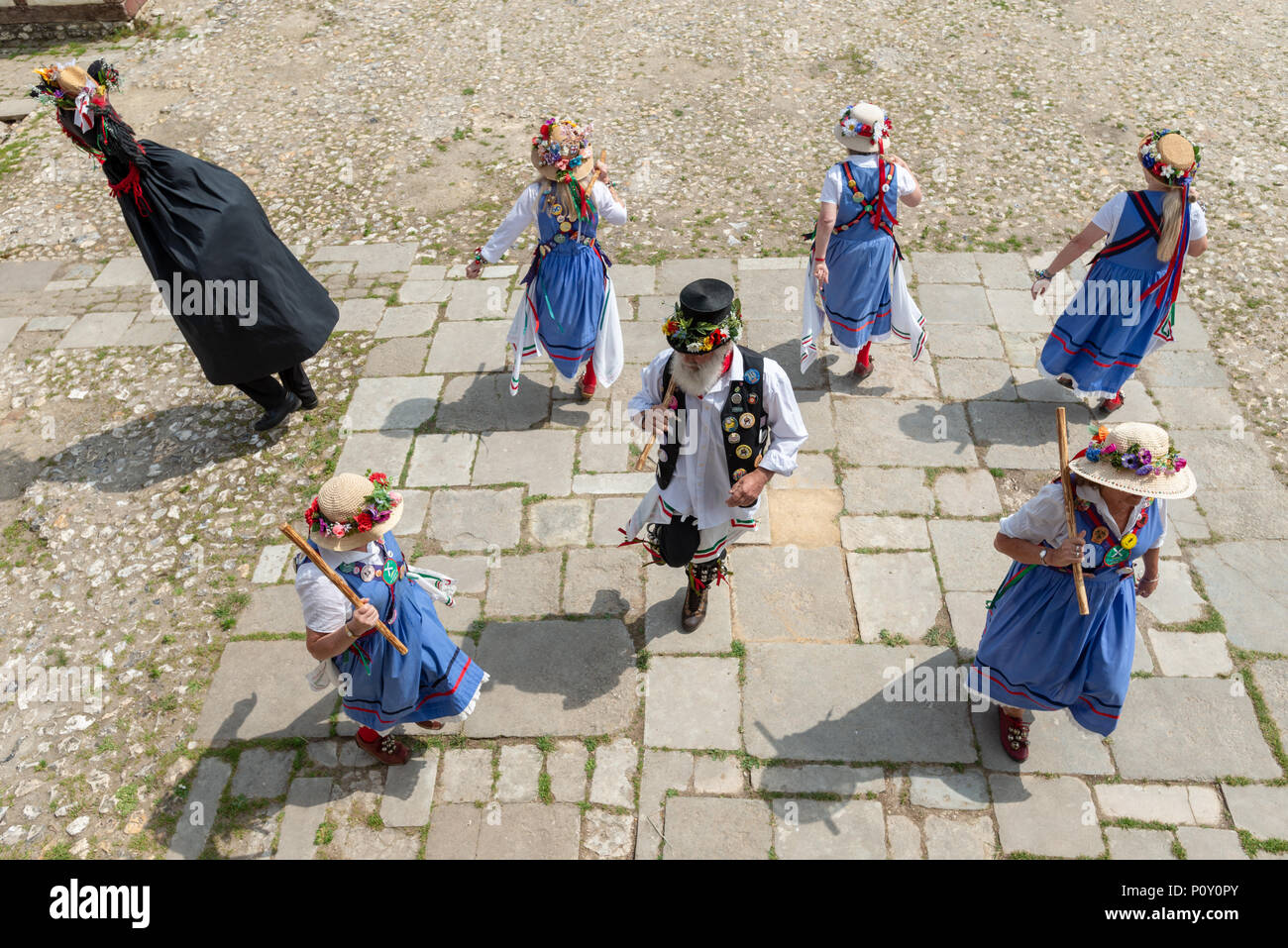 An overhead view of morris dancers dressed in traditional costumes ...