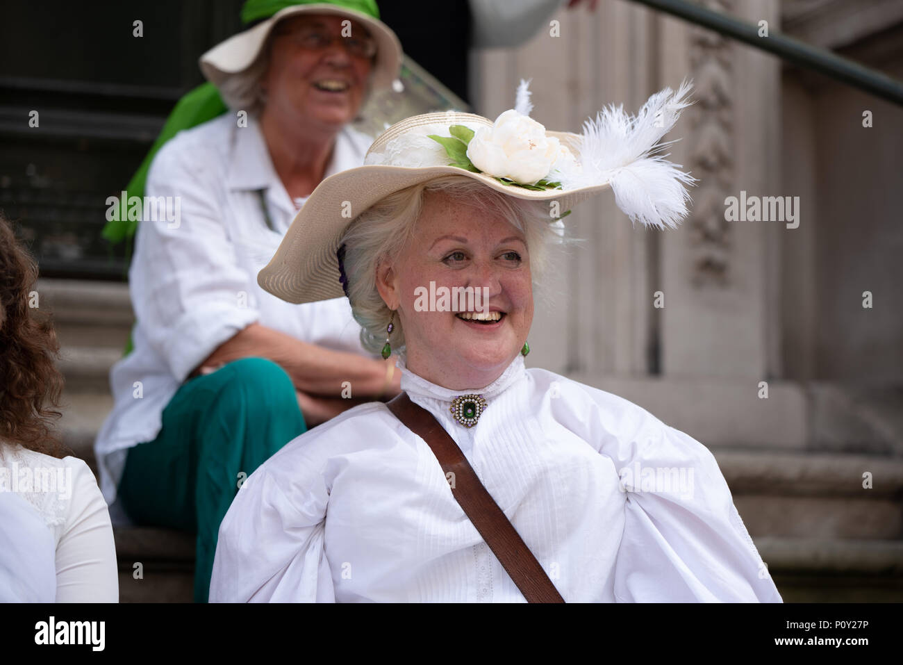 Women marching through London to mark 100 years since the first British ...