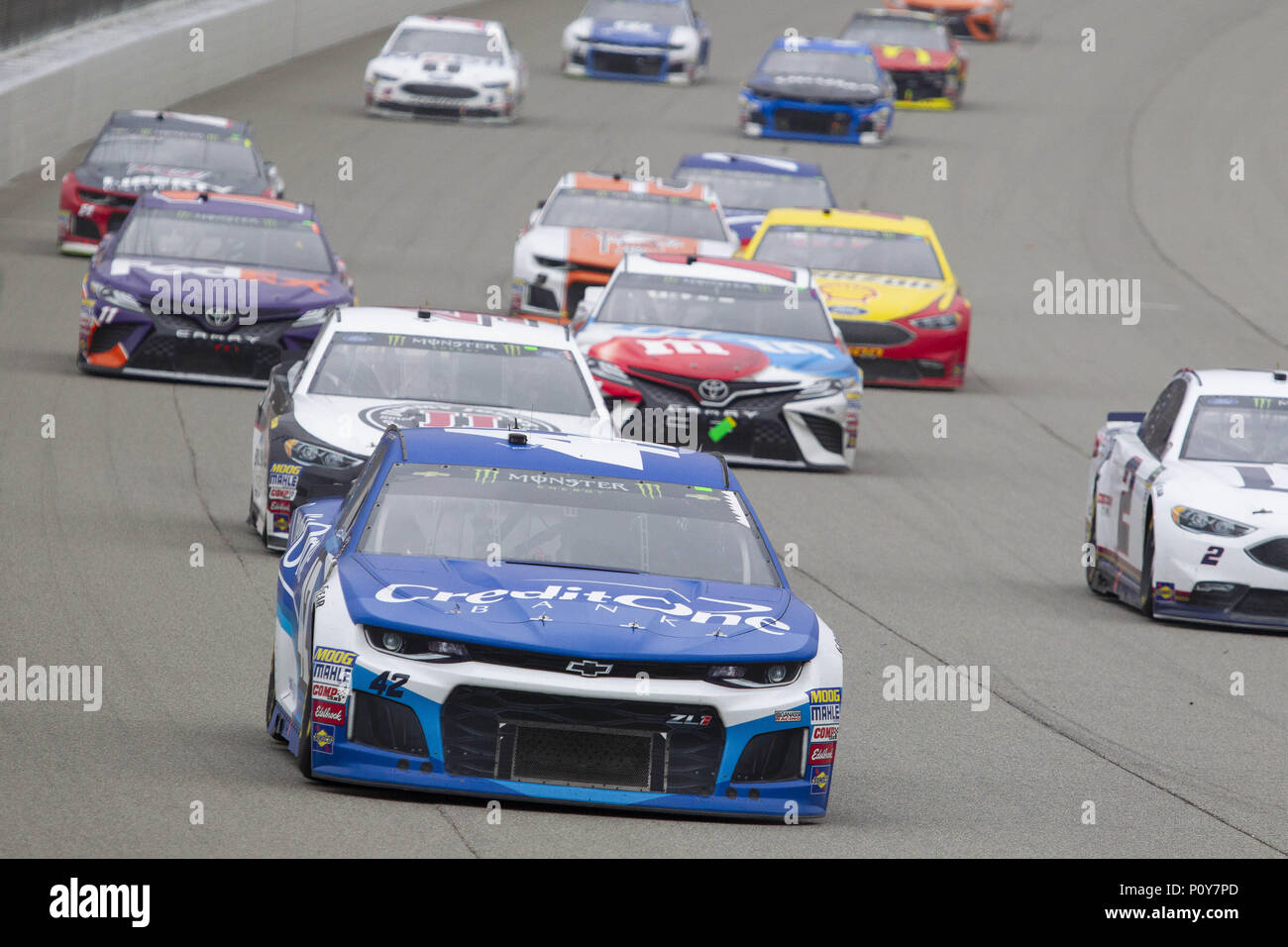 Brooklyn, Michigan, USA. 10th June, 2018. NASCAR drivers follow the ...