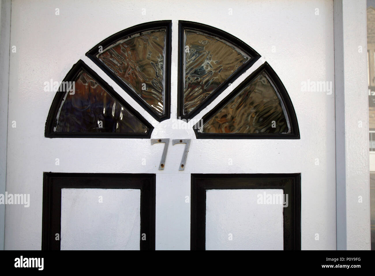 number 77 door in Dinnington South Yorkshire an old mining town Stock ...