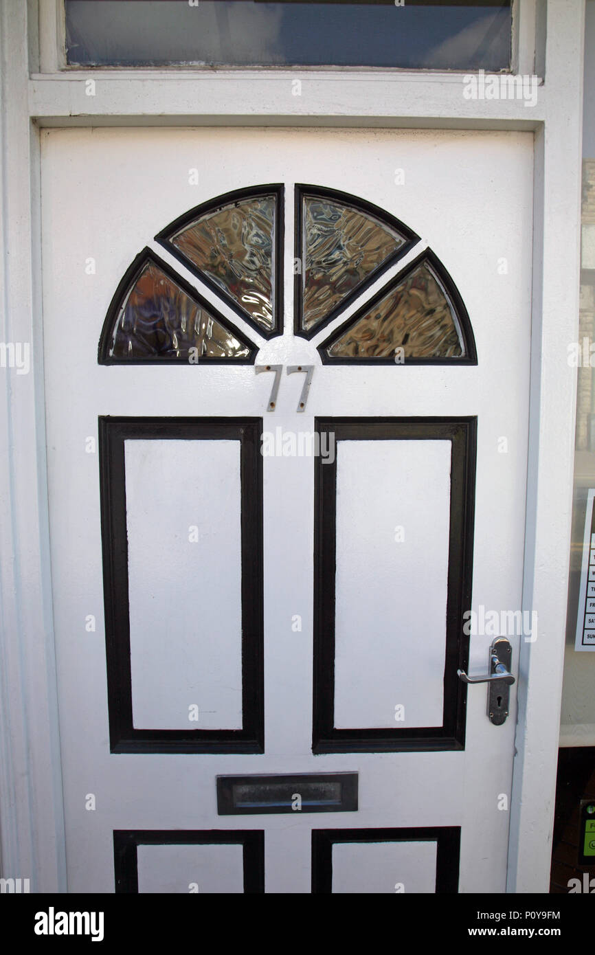 number 77 door in Dinnington South Yorkshire an old mining town Stock ...