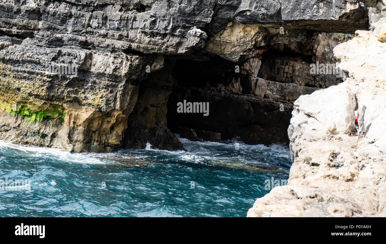 Clear and crystalline sea with white rocks Stock Photo - Alamy