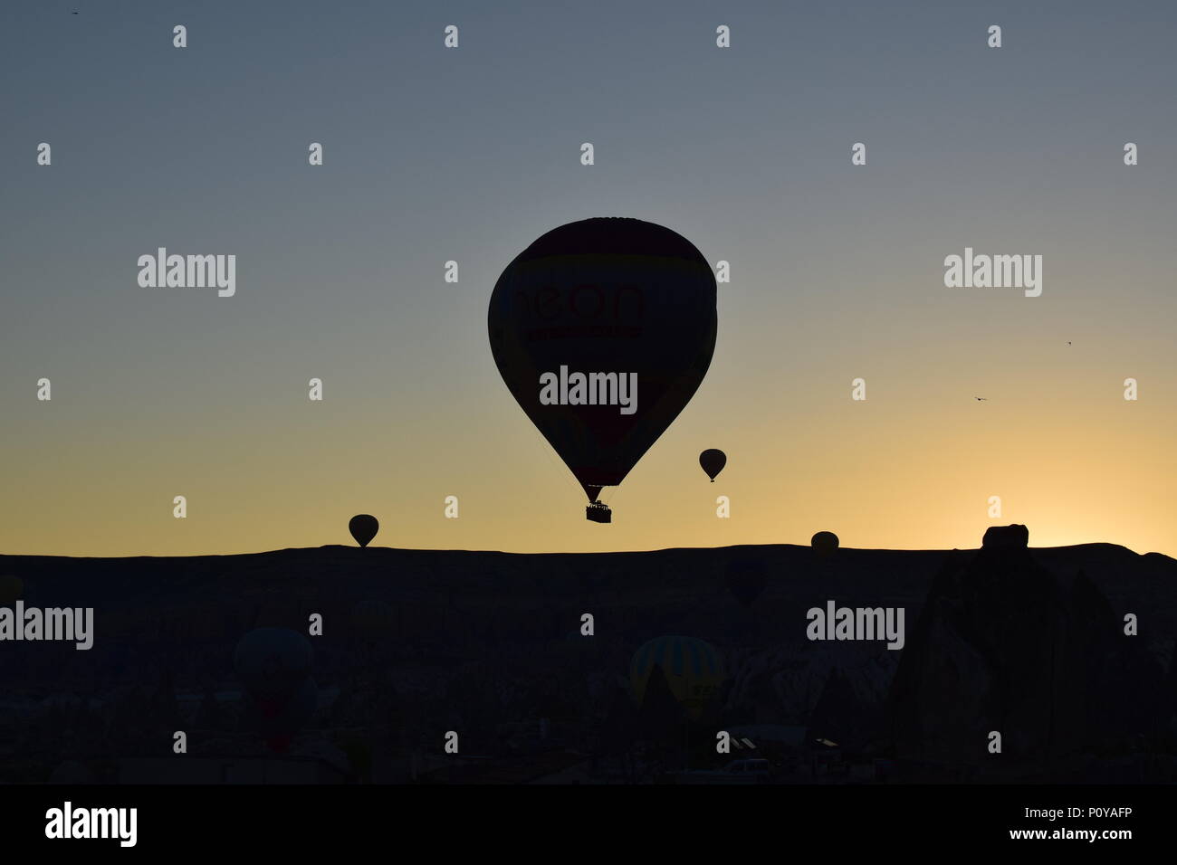 Hot air balloons at sunset Stock Photo - Alamy