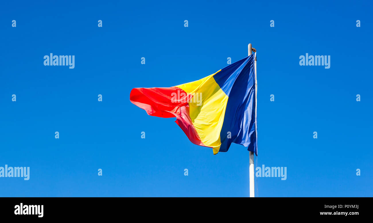 Romanian Flag on the mast. Romania flag of silk. Romanian flag on ...