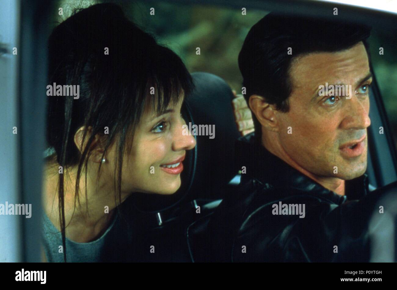 Sylvester stallone madeleine stowe avenging hi-res stock photography ...