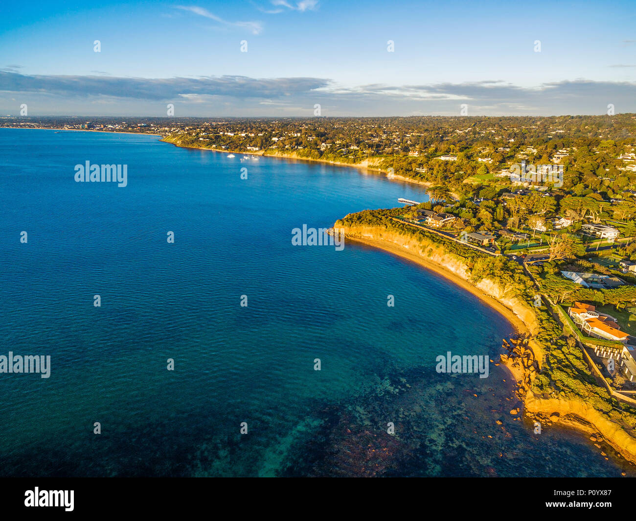 Bird's eye view of Mornington Peninsula coastline at sunset. Melbourne ...