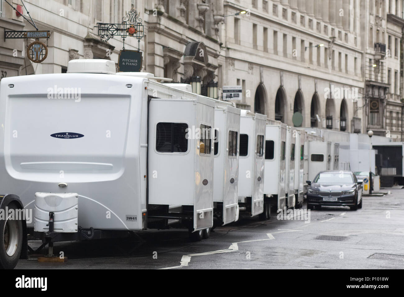 filming crew trailers in London Stock Photo - Alamy