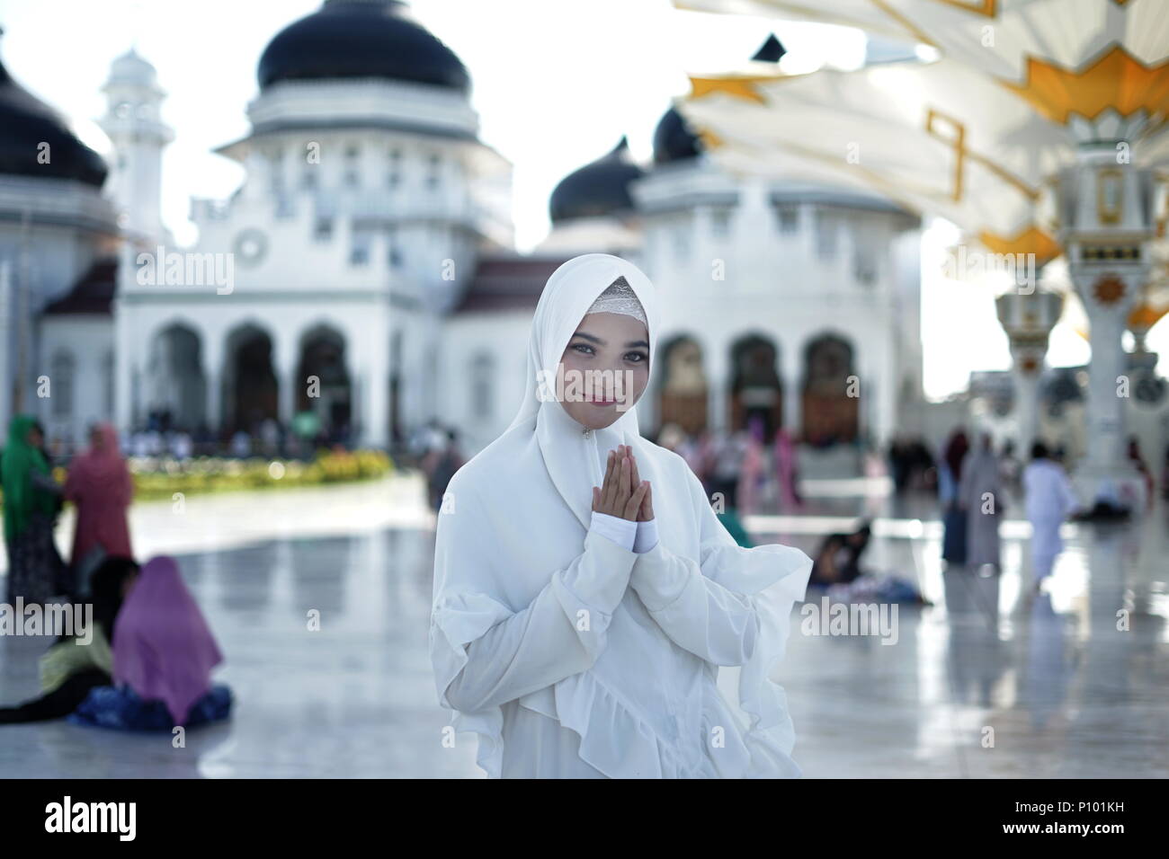 Religious Beautiful asian muslim woman praying in mosque Stock Photo ...