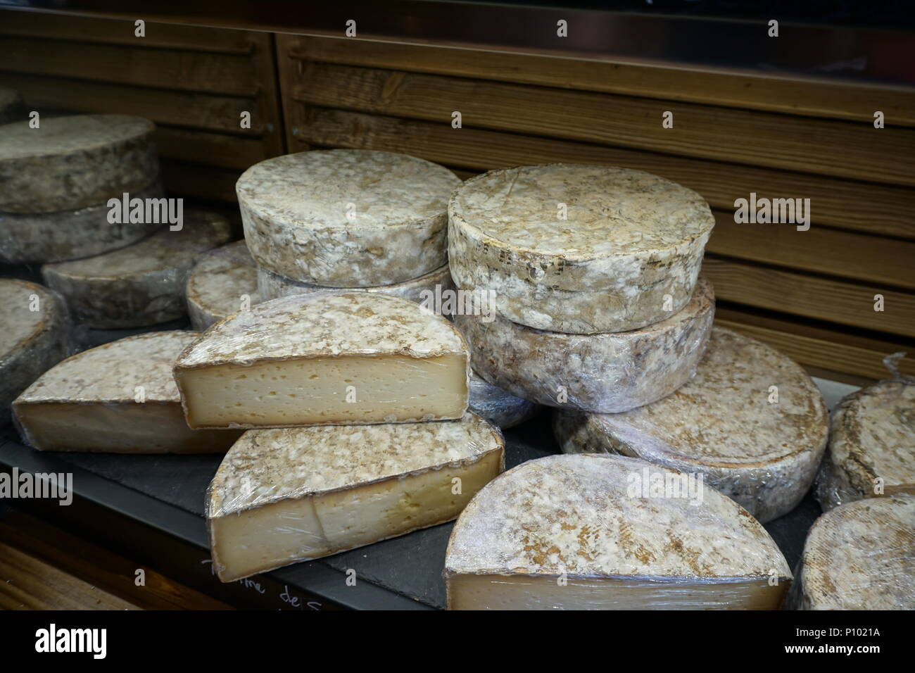 Yummy french mountain cheeses on display in a store in the Alps Stock ...