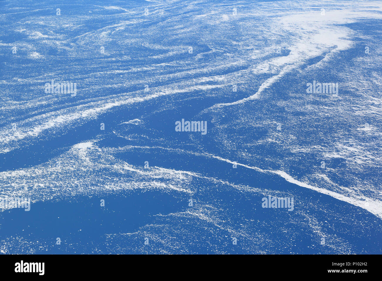 Aerial view of floating sea ice caught in marine currents off the ...