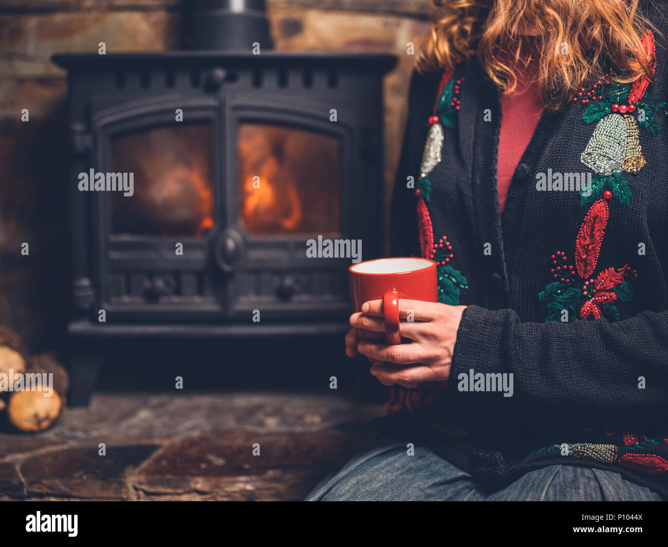 Wearing jumper by the fire hi-res stock photography and images - Alamy
