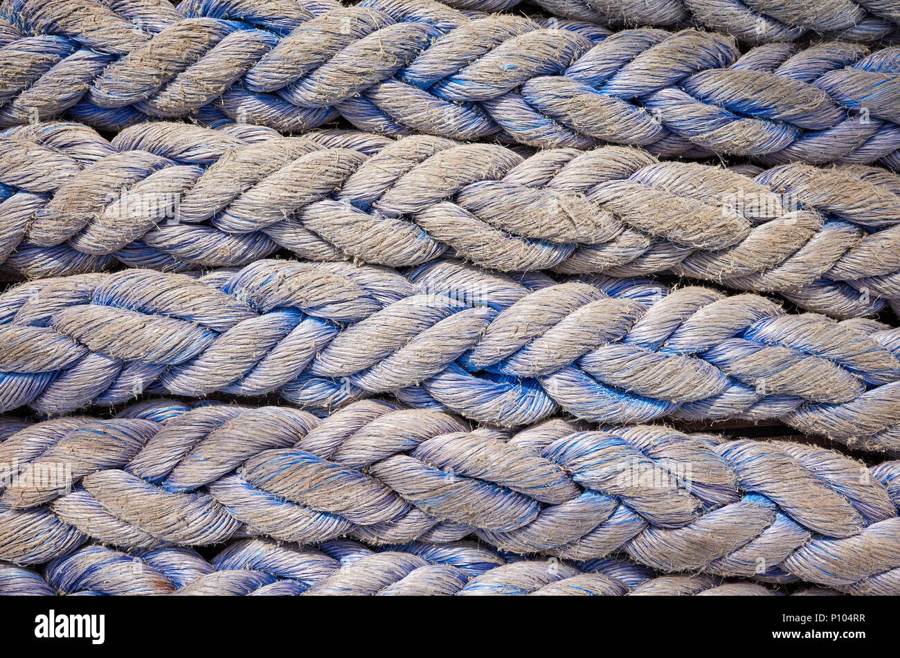 Close up picture ofold frayed boat ropes, abstract background or ...