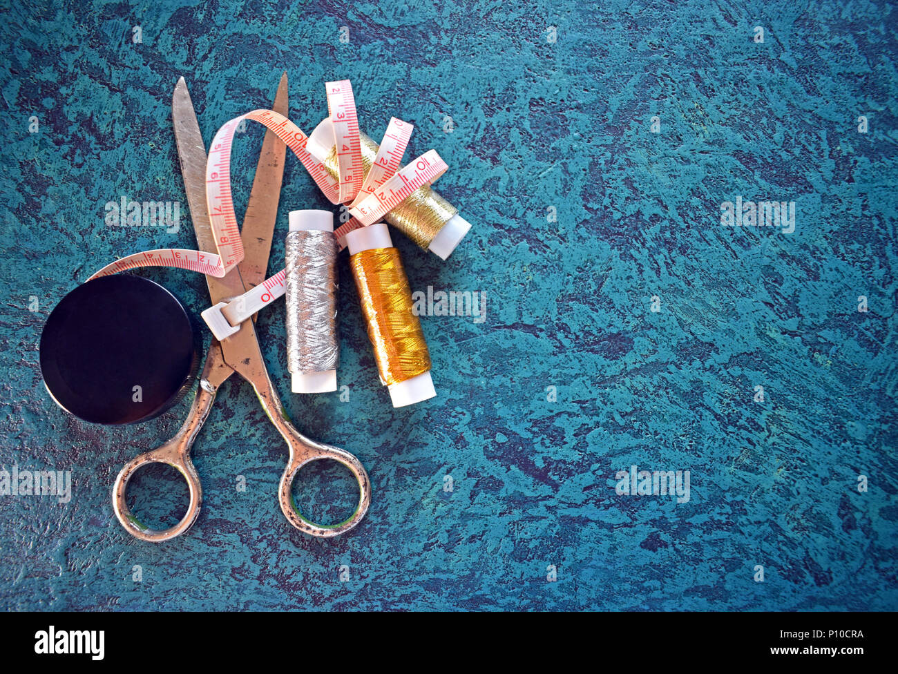 scissors and threads Stock Photo - Alamy