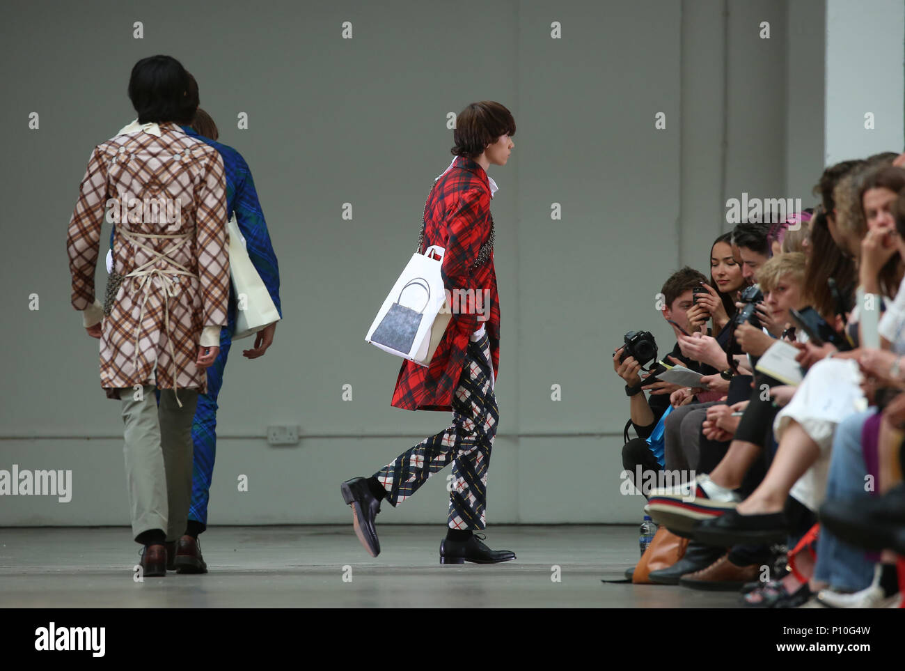 Models on the Stefan Cooke catwalk during the MAN London Fashion Week ...