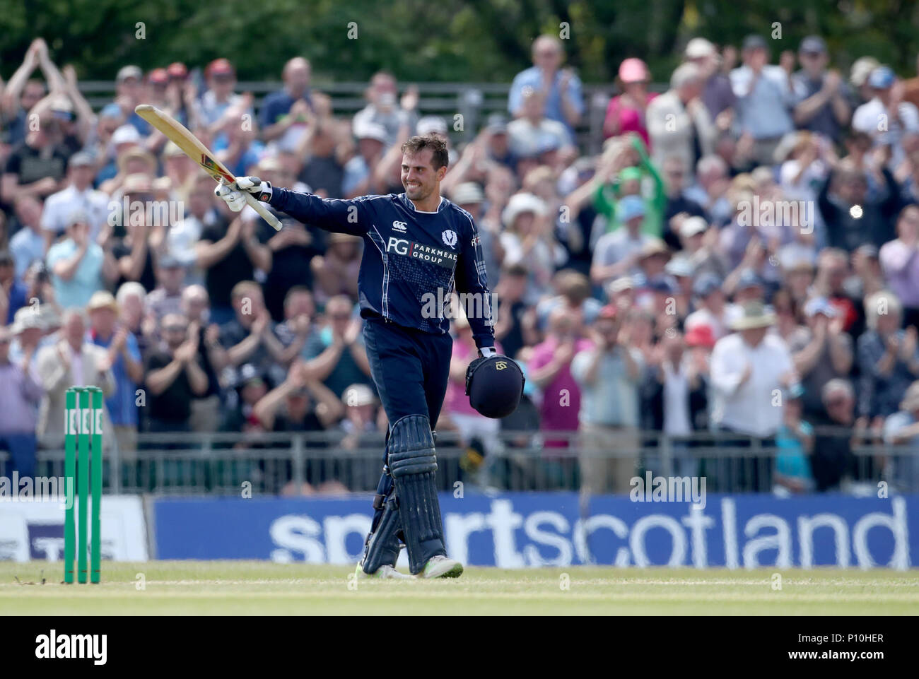 Scotland's Calum MacLeod celebrates his century during the One Day ...