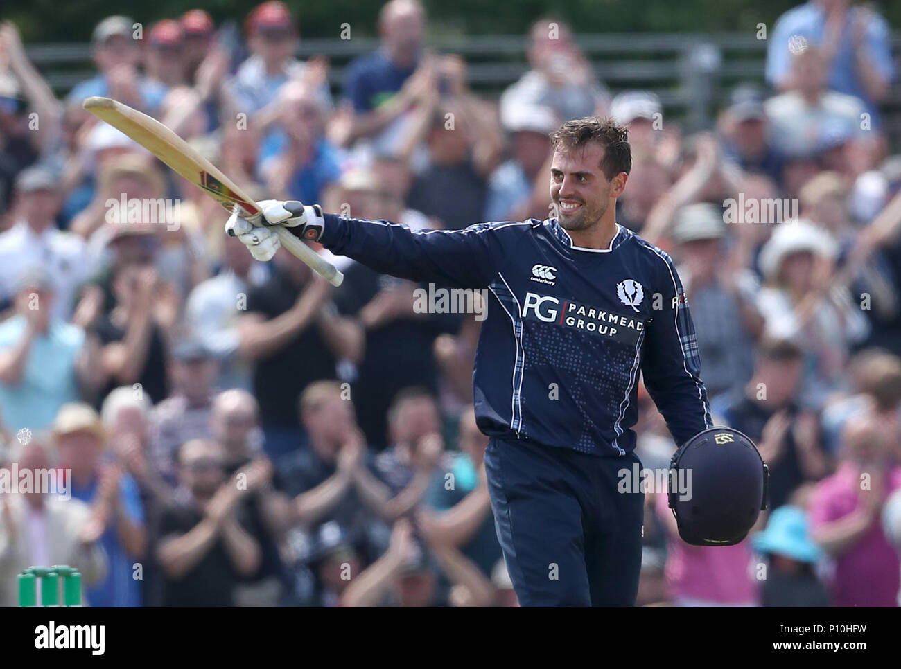 Scotland's Calum MacLeod celebrates his century during the One Day ...