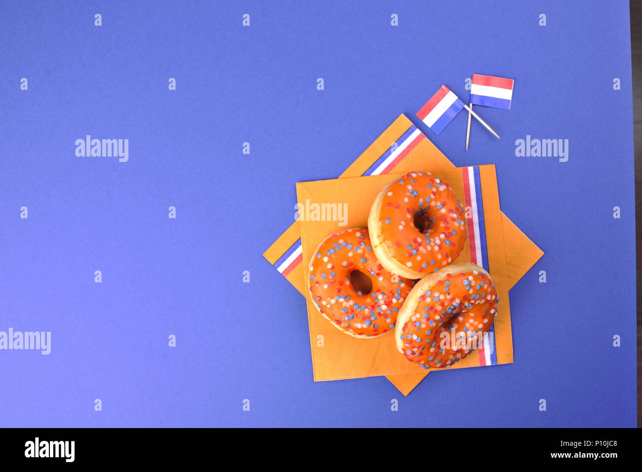 Sweet pastries for the feast day of the King. Orange decoration ...