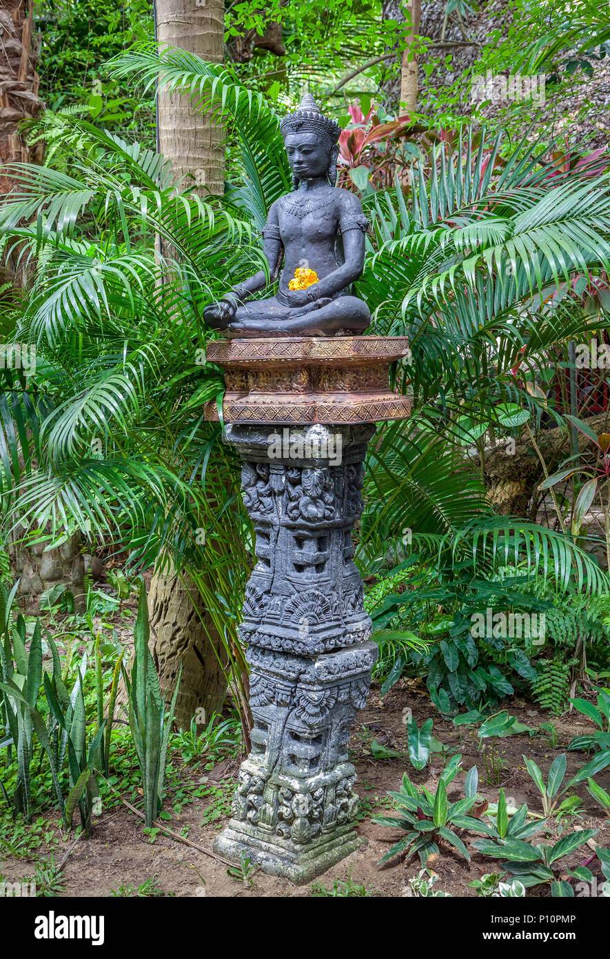 Buddha grass statue stone hi-res stock photography and images - Alamy