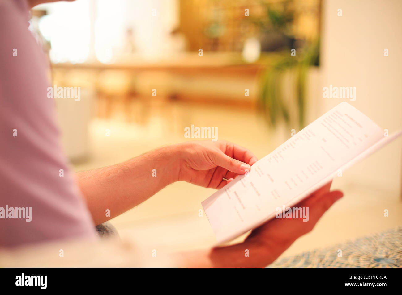 Man menu restaurant looking hi-res stock photography and images - Alamy