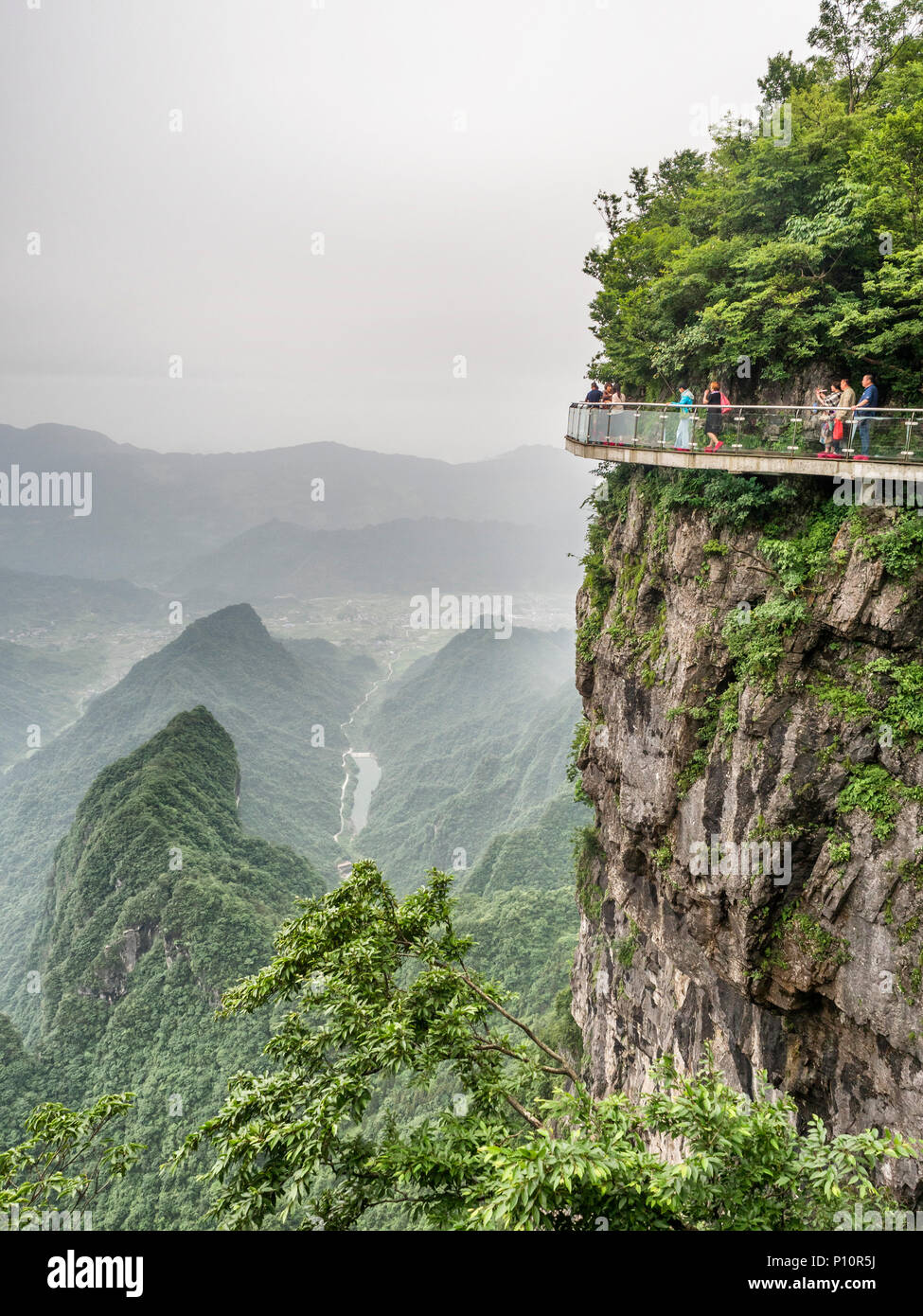 28 May 2018: Tourists walking at The Bridge at Tianmen Mountain, The ...