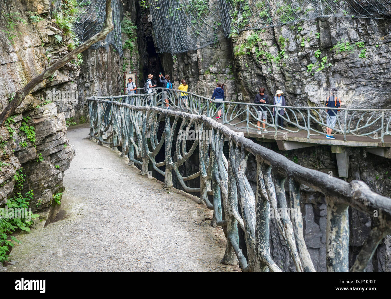 28 May 2018: Tourists walking at The Bridge at Tianmen Mountain, The ...
