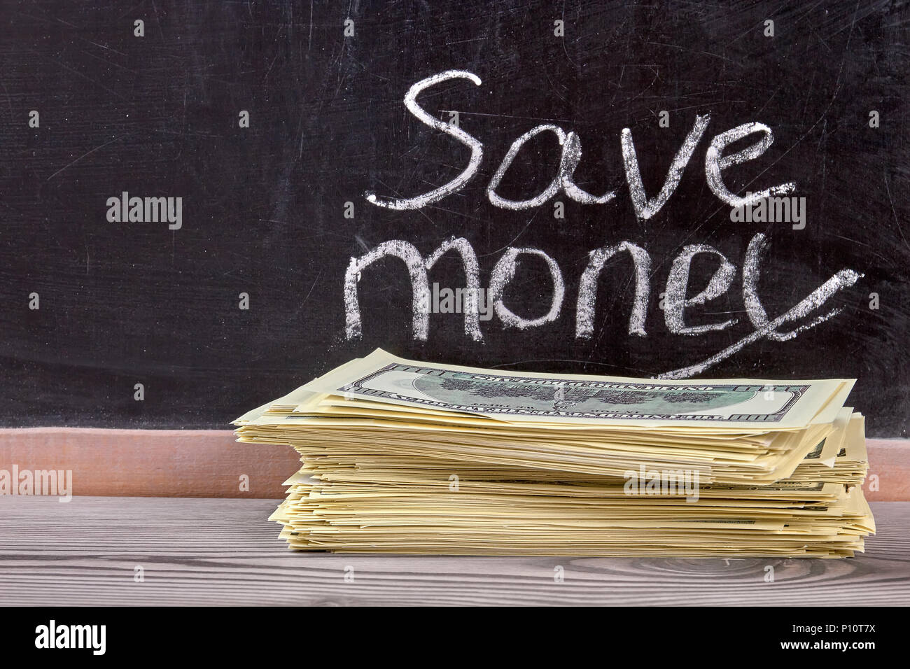 Cash money savings. Stack of dollar bills Stock Photo - Alamy