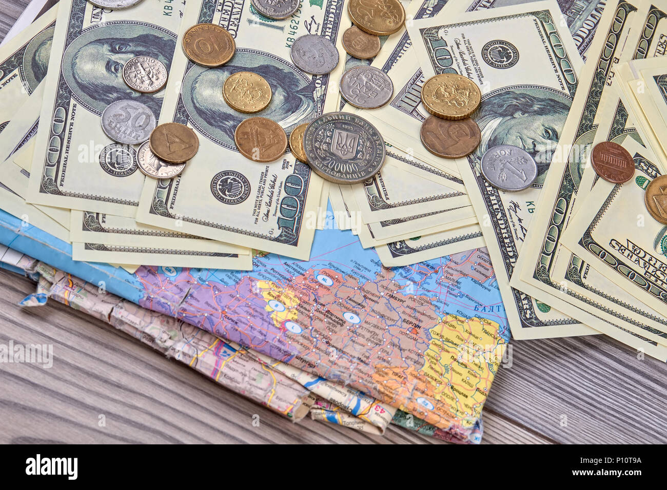 Money and map, close up. Paper banknotes and coins. Top view Stock ...