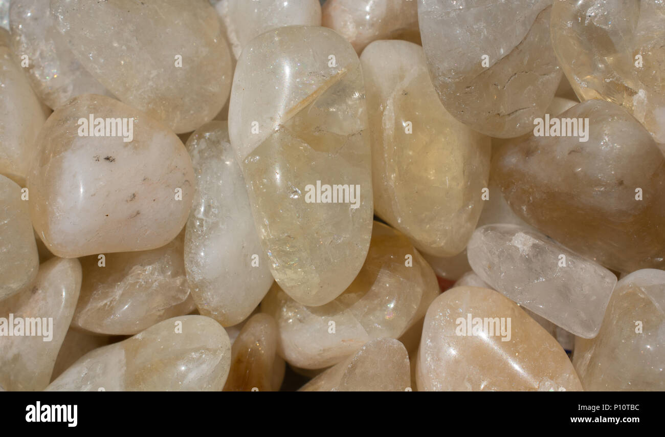 Tumbled scitrine gem stone as mineral rock geode Stock Photo - Alamy
