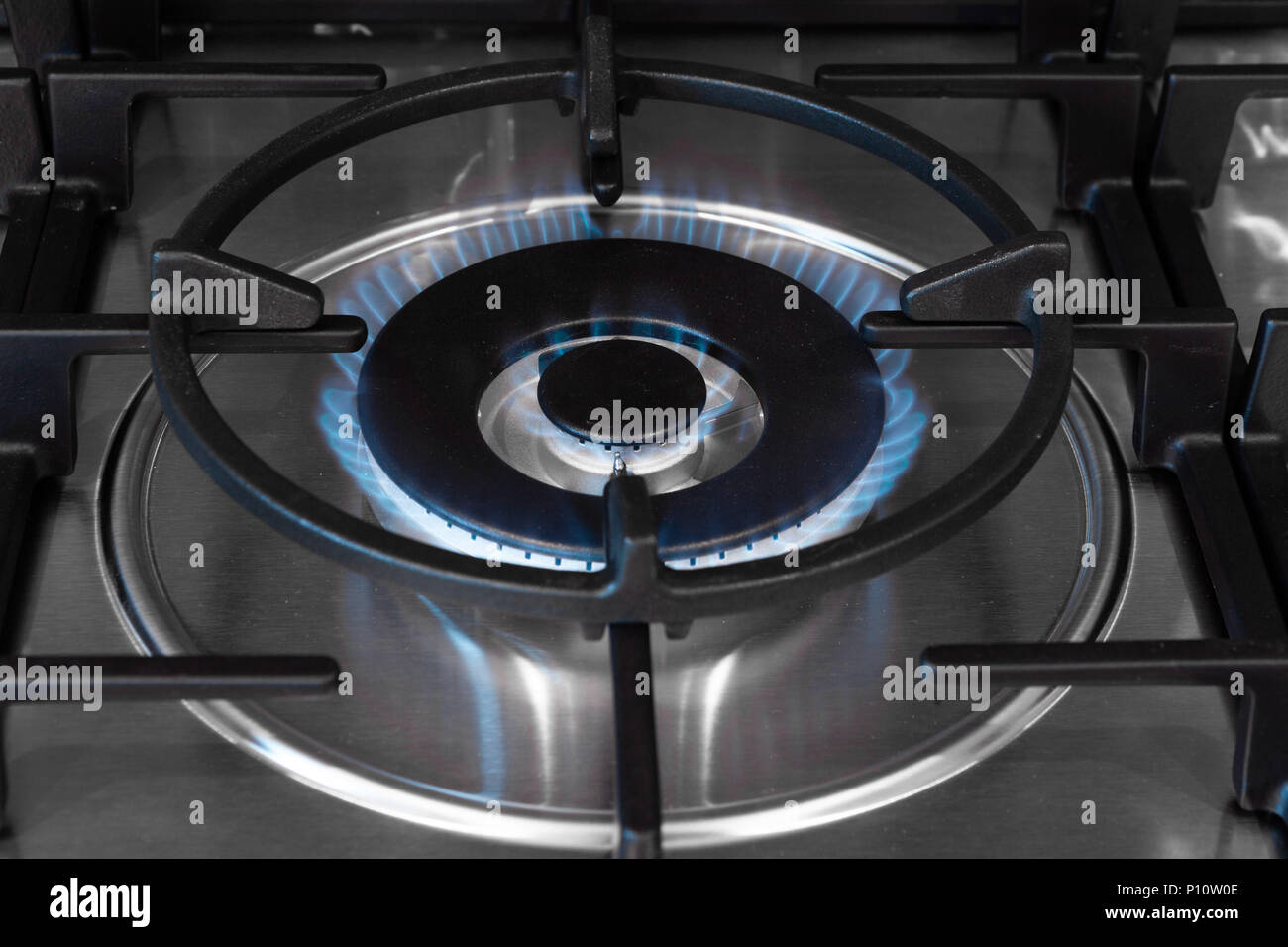Stove turbo burner with burning flame closeup Stock Photo - Alamy