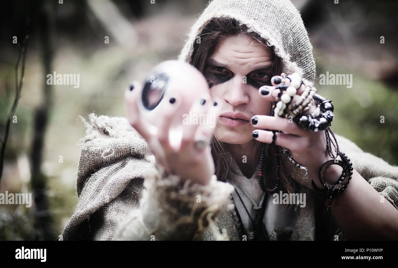 Fairy magician. A sorcerer with a glass sphere, a magical spell and a ...