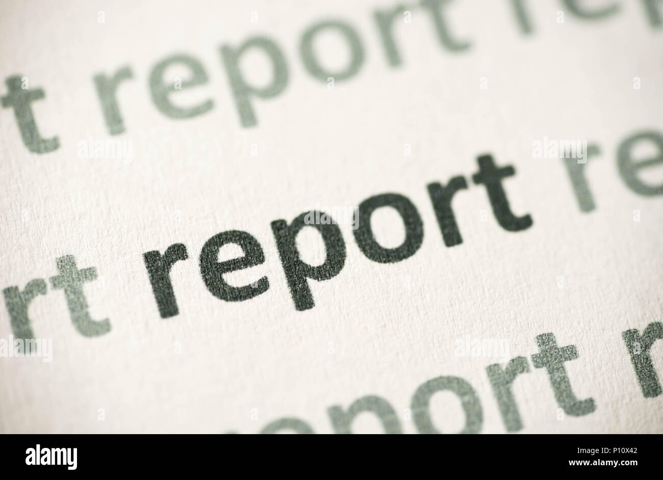 word report printed on white paper macro Stock Photo - Alamy