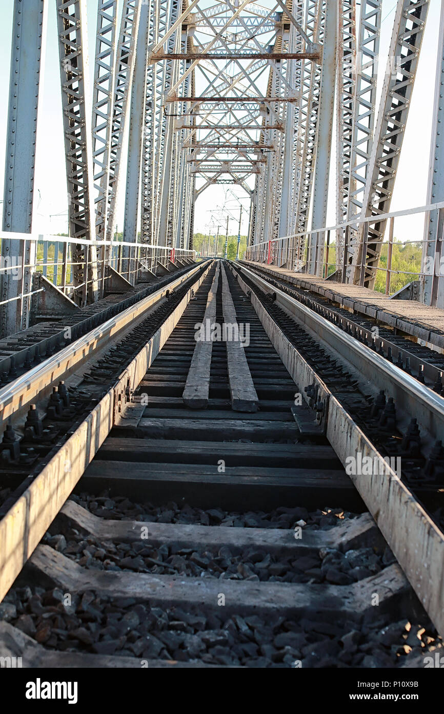 bridge on railroad tracks and industrial gray stone Stock Photo - Alamy