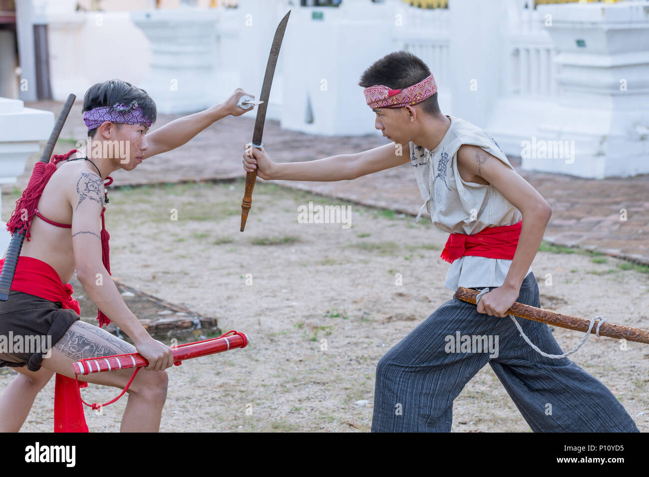 Thai ancient warrior swordsmanship fighting action with sword and spear ...