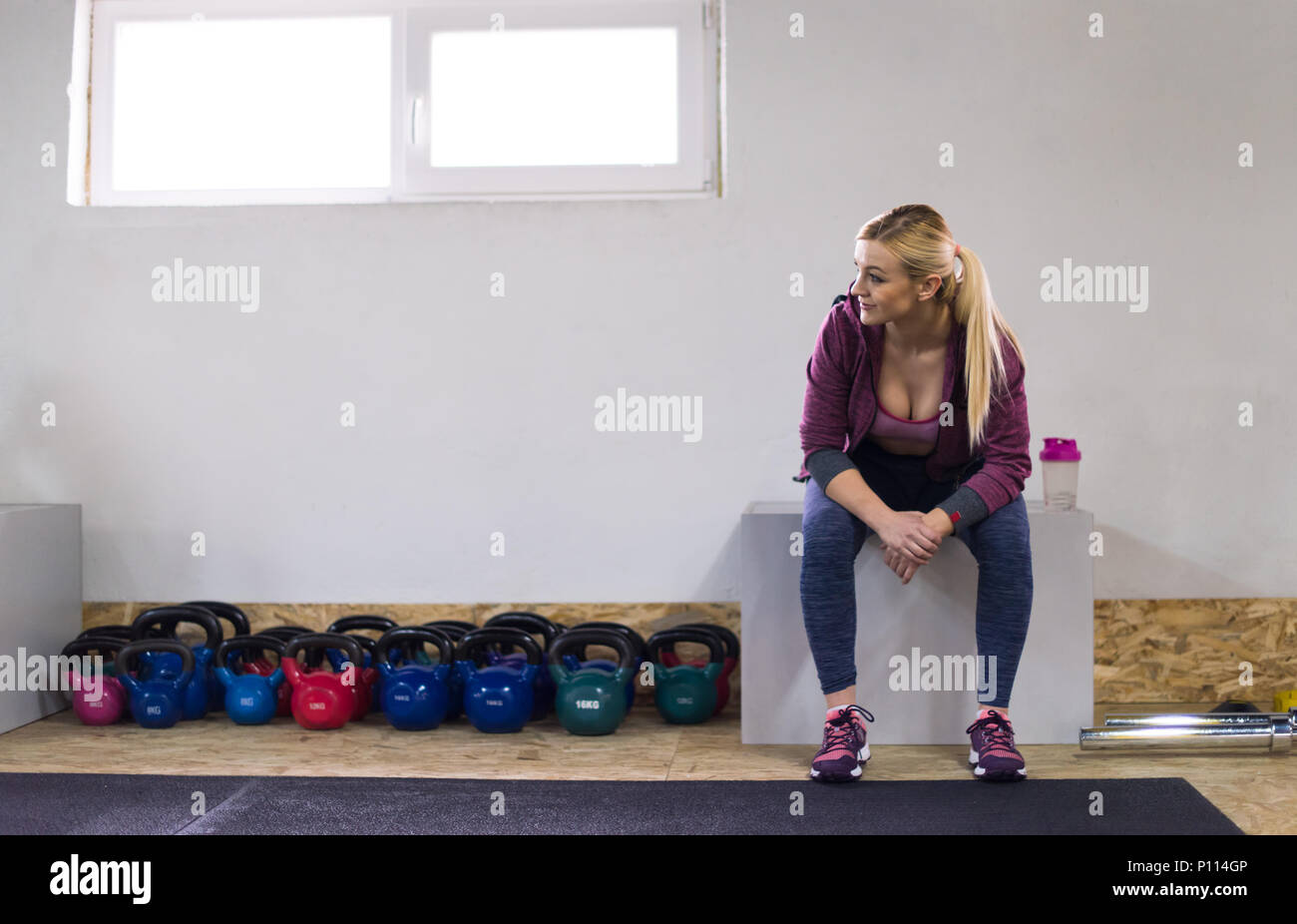 Athletic woman relaxing after cross hi-res stock photography and images ...