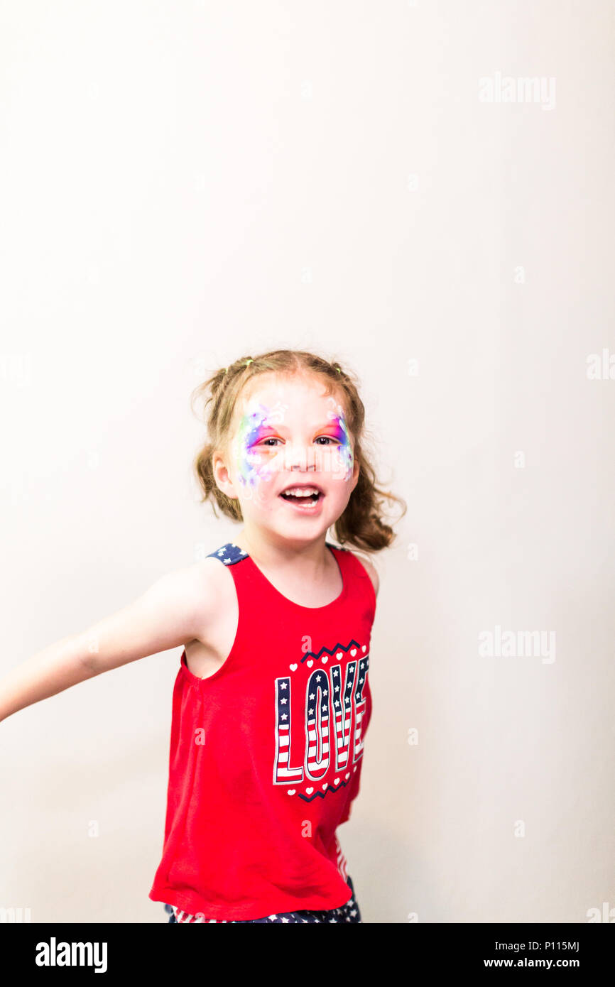 Portrait of little girl having fun in Jule 4th outfit Stock Photo - Alamy