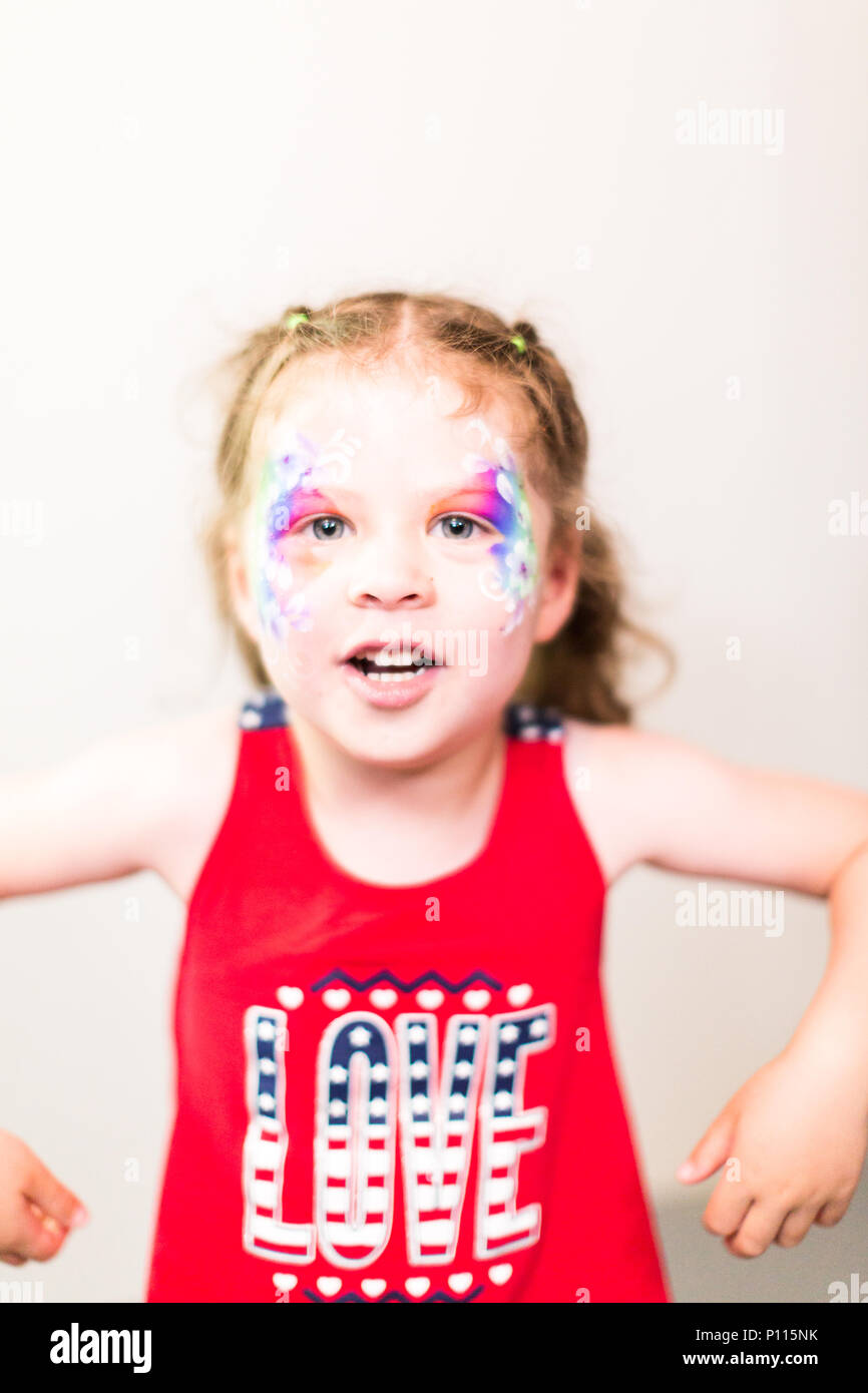 Portrait of little girl having fun in Jule 4th outfit Stock Photo - Alamy