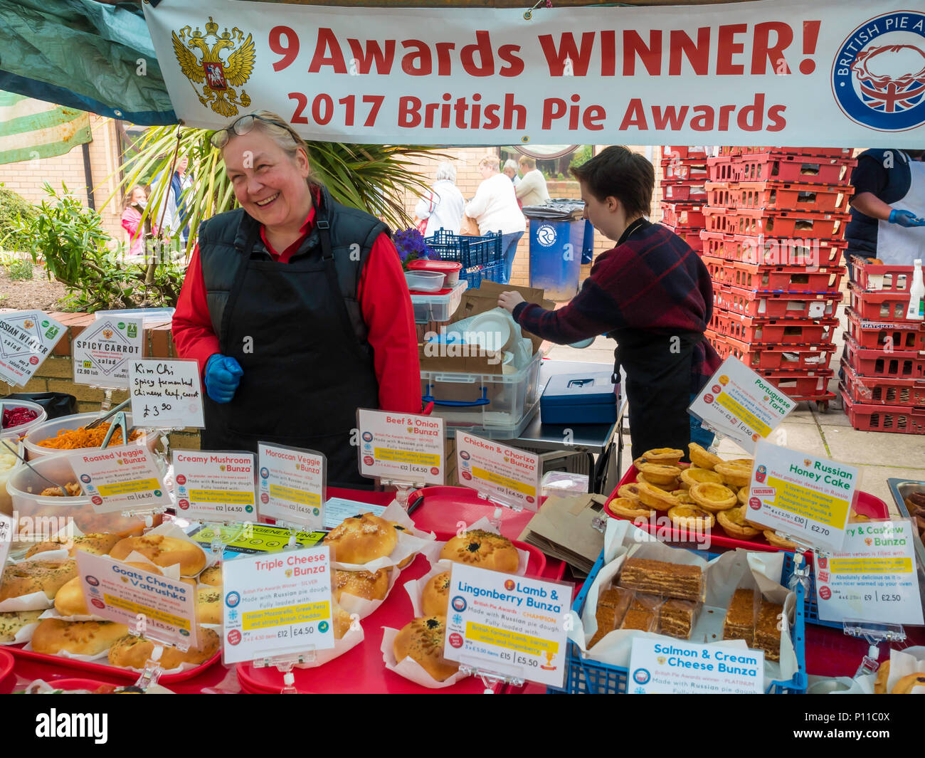 Lady stallholder with display of her popular Cossack Cuisines prize ...
