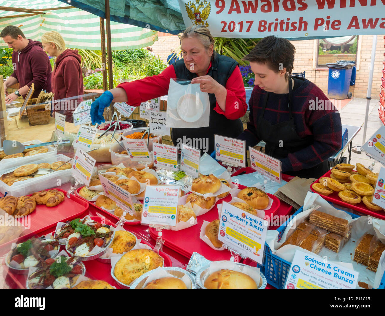 Lady stallholder with display of her popular Cossack Cuisines prize ...