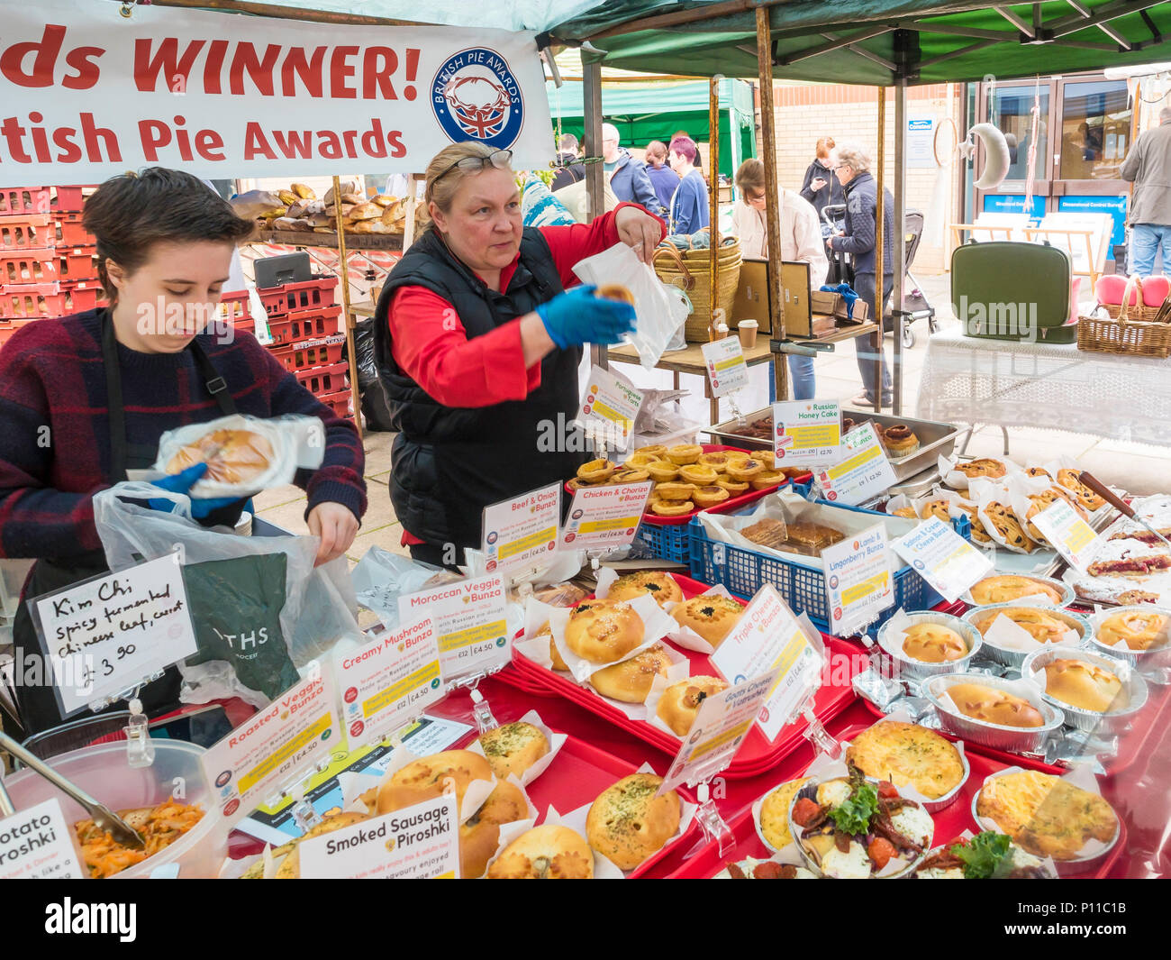 Lady stallholder with display of her popular Cossack Cuisines prize ...