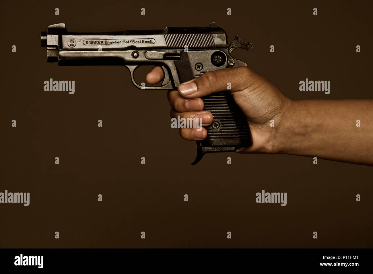 Hand gun automatic hi-res stock photography and images - Alamy
