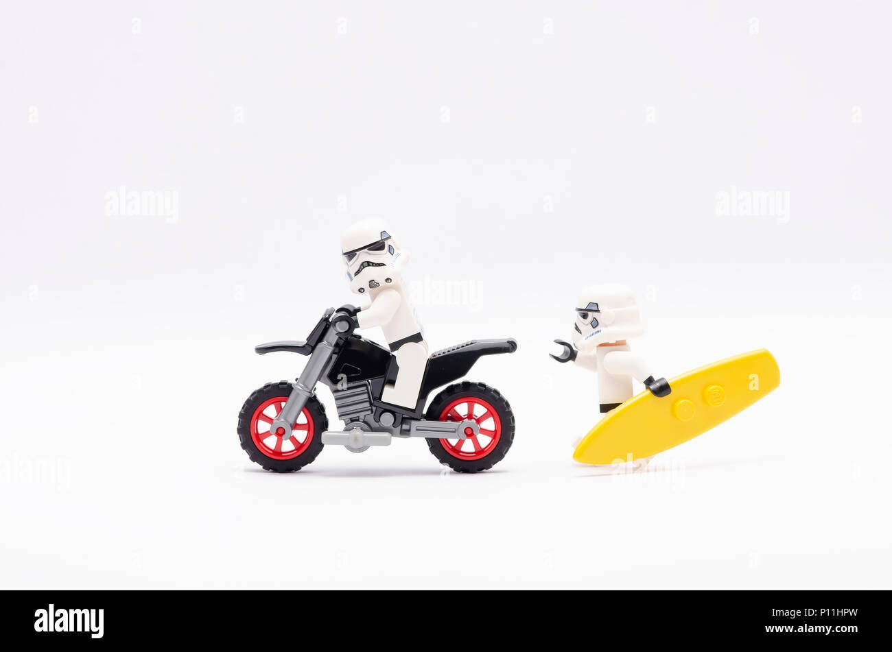 mini figure of storm troopers riding motorcycle with one of them ...
