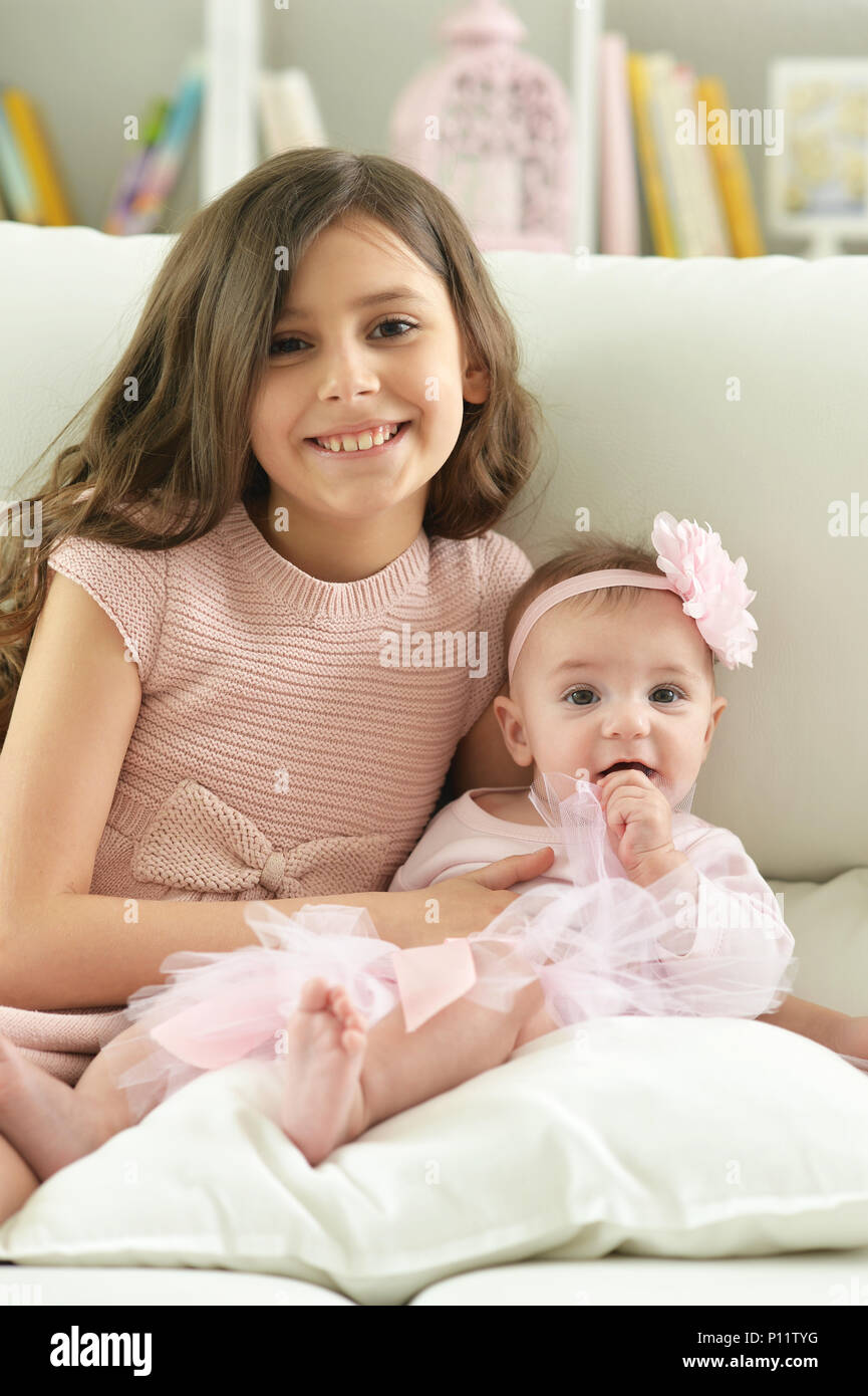 Beautiful happy family two daughters hi-res stock photography and ...